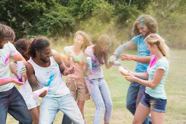 Friends having fun with powder paint - Stock Image - Everypixel