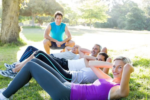 Happy athletic group training - Stock Image - Everypixel