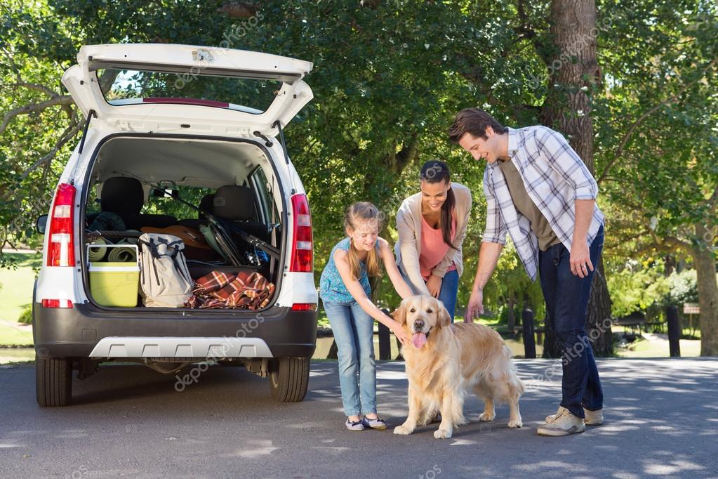 Family getting ready to go on road trip — Stock Photo © Wavebreakmedia ...