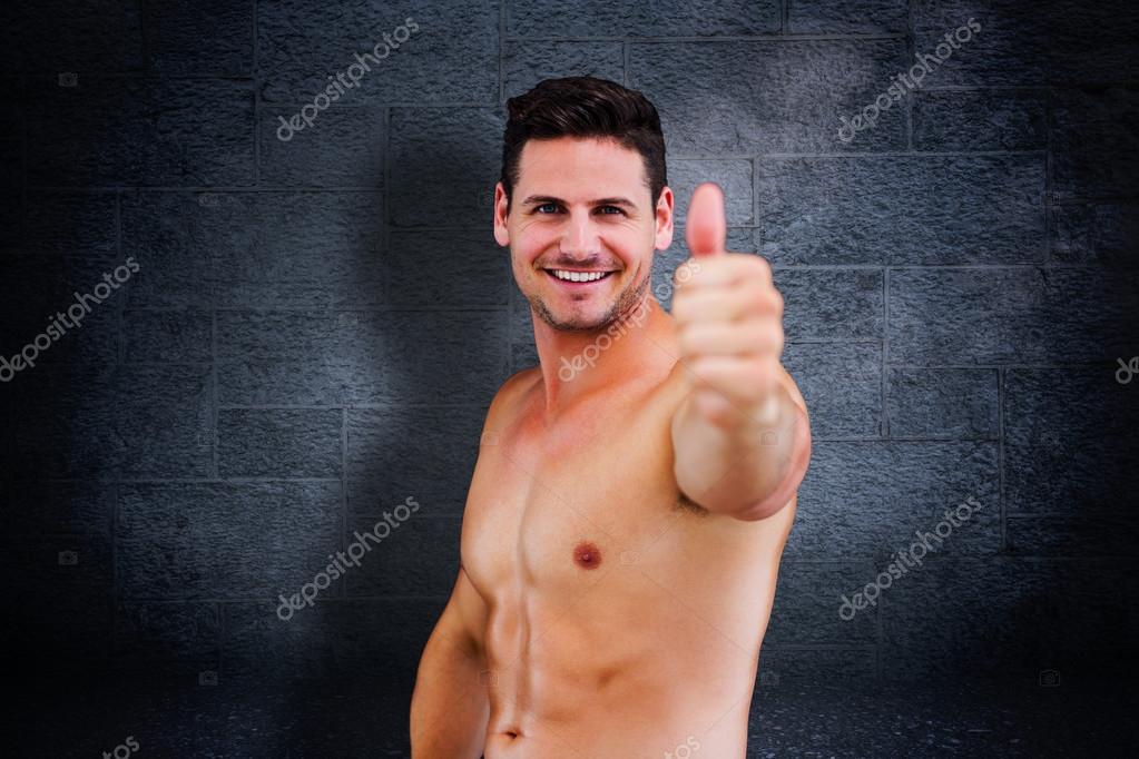 Muscular bodybuilder showing thumbs up Stock Photo by ©Wavebreakmedia ...