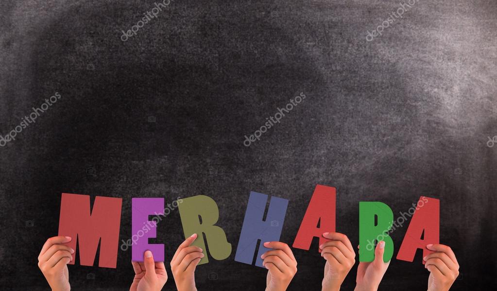 Hands holding up merhaba Stock Photo by ©Wavebreakmedia 73178791