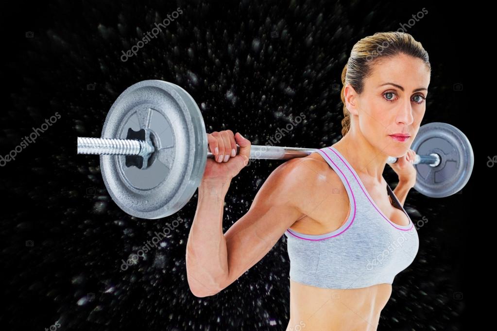 Composite image of strong female crossfitter lifting barbell beh ...