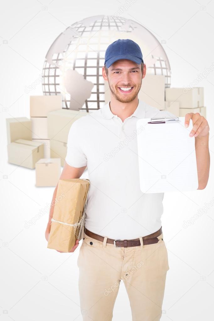 Delivery man holding cardboard box — Stock Photo © Wavebreakmedia #76119489