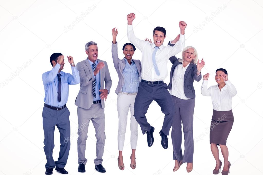 Business people cheering in office Stock Photo by ©Wavebreakmedia 76337417