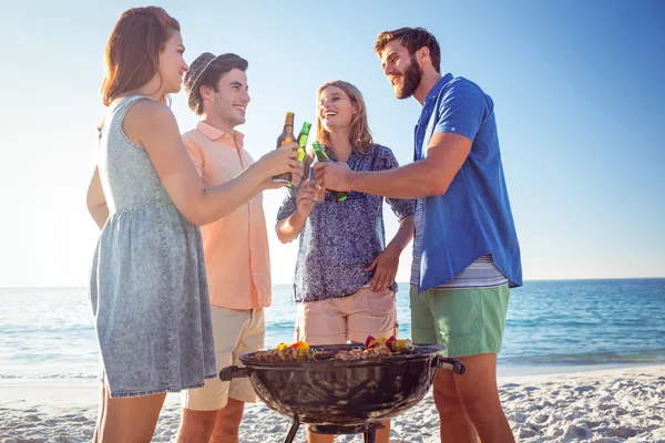 Happy friends doing barbecue and drinking beer - Stock Image - Everypixel