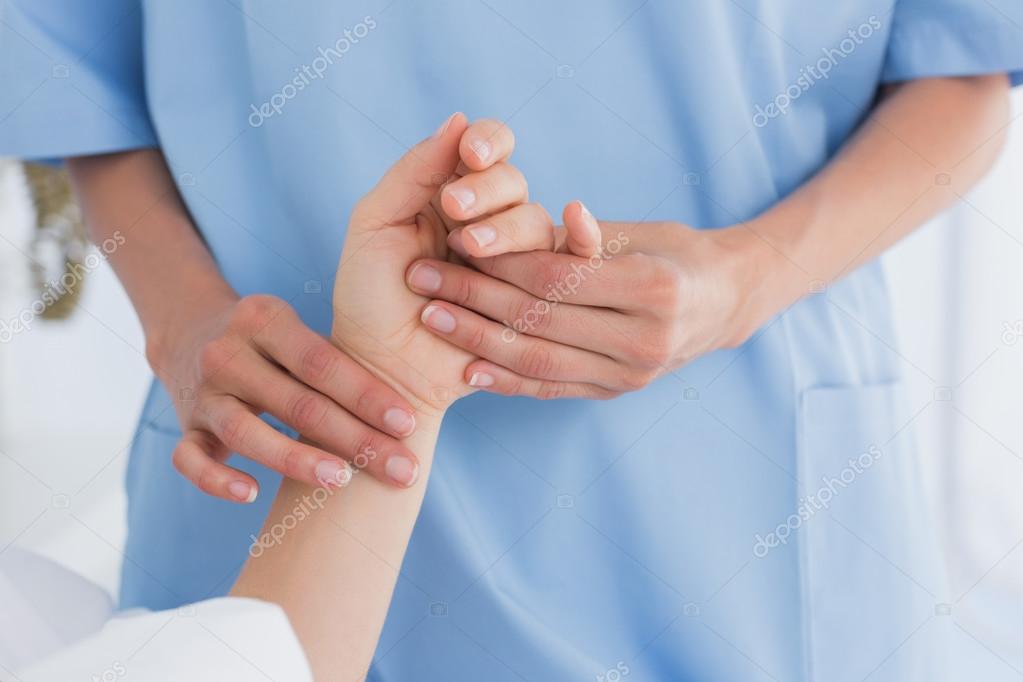 Doctor checking her patients heartbeat Stock Photo by ©Wavebreakmedia ...