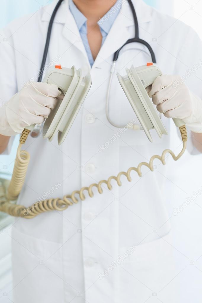 A doctor save a patient life Stock Photo by ©Wavebreakmedia 76349715