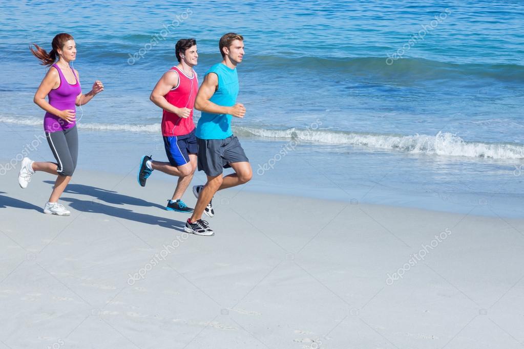 Friends doing jogging together Stock Photo by ©Wavebreakmedia 76350717