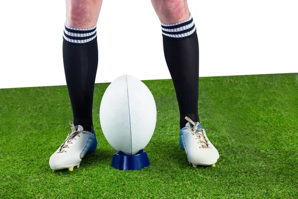 Player preparing for a drop kick — Stock Photo © Wavebreakmedia #84459906