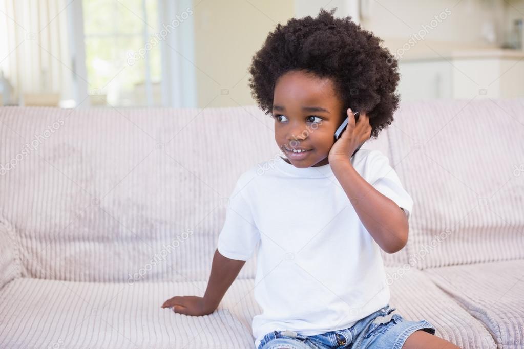 Little boy using a technology and phoning Stock Photo by ...