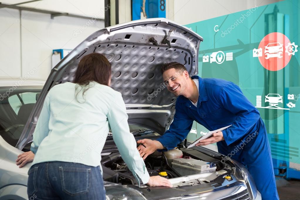 Mechanic showing customer the problem with car — Stock Photo ...