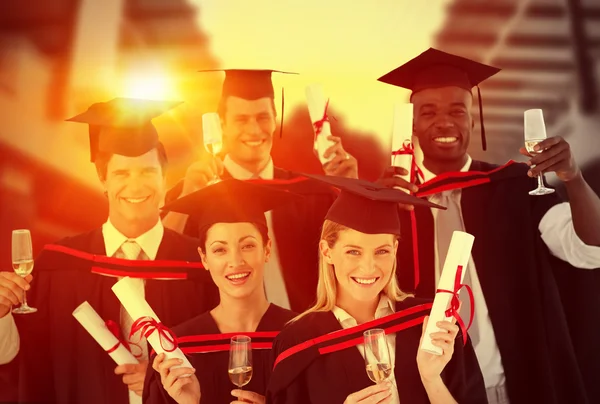Young woman Graduating holding her Diploma Stock Photo by ...