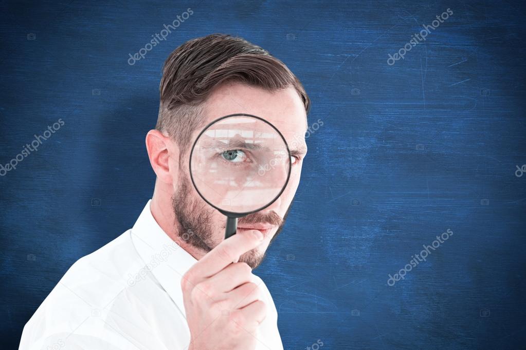 Businessman looking through magnifying glass — Stock Photo ...