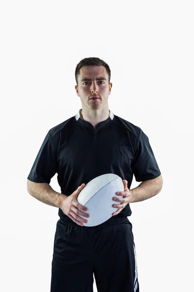 Player walking and holding football Stock Photo by ©Wavebreakmedia 84471670