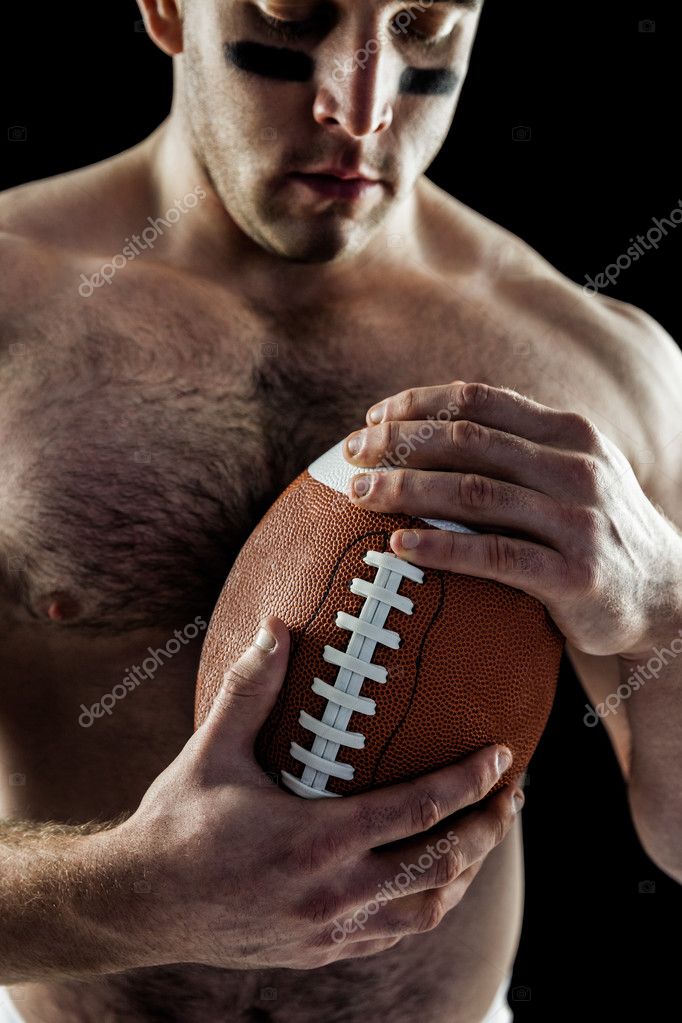 Football player with ball Stock Photo by ©Wavebreakmedia 84464898