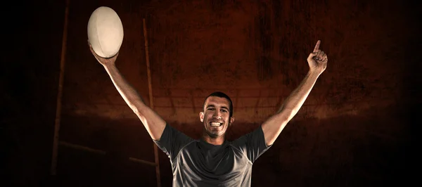 Player thinking while holding ball Stock Photo by ©Wavebreakmedia 84681328