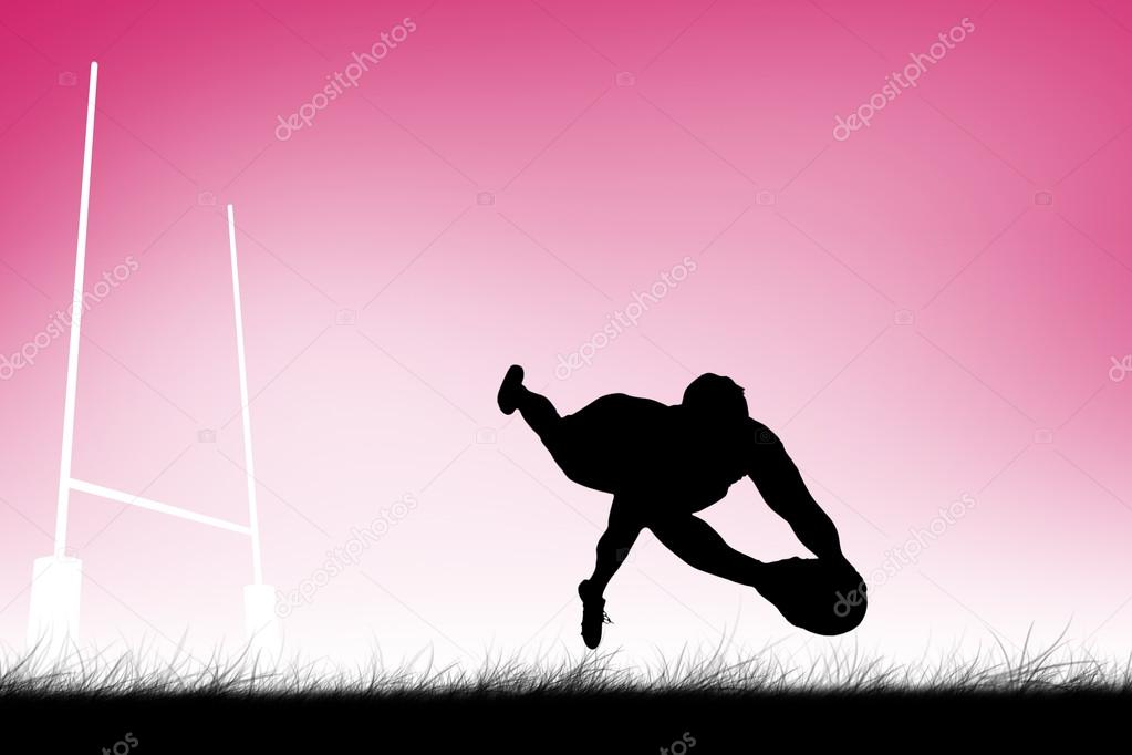 Rugby player scoring a try Stock Photo by ©Wavebreakmedia 84684334