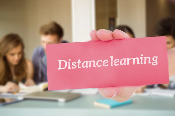 Word distance learning and hand showing card - Stock Image - Everypixel