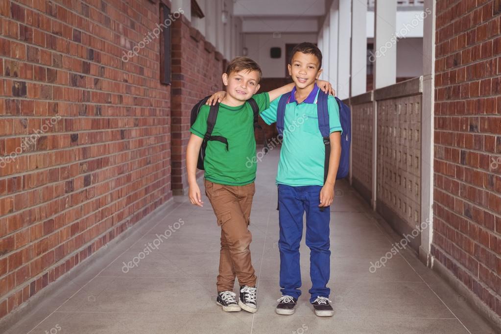Smiling happy students looking at the camera Stock Photo by ...