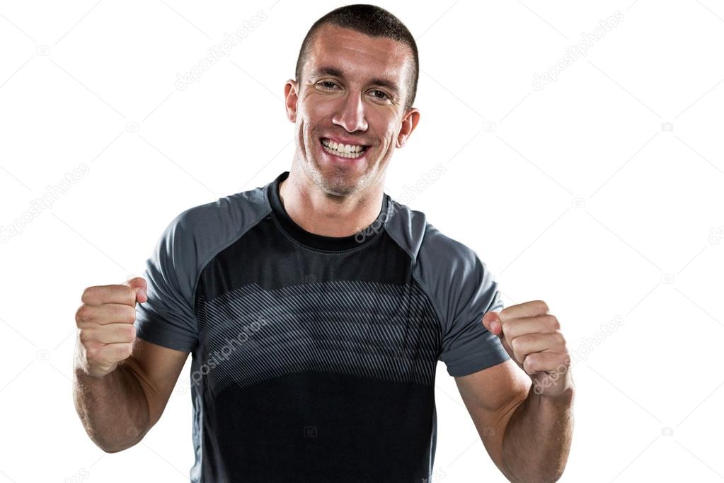 Happy rugby player standing Stock Photo by ©Wavebreakmedia 84886284