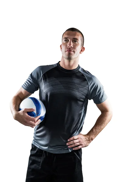 Shirtless rugby player holding ball Stock Photo by ©Wavebreakmedia 84899336