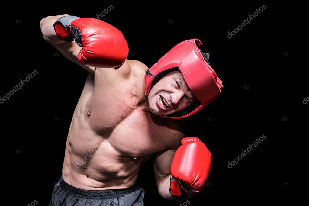 Aggressive boxer against black background Stock Photo by ...