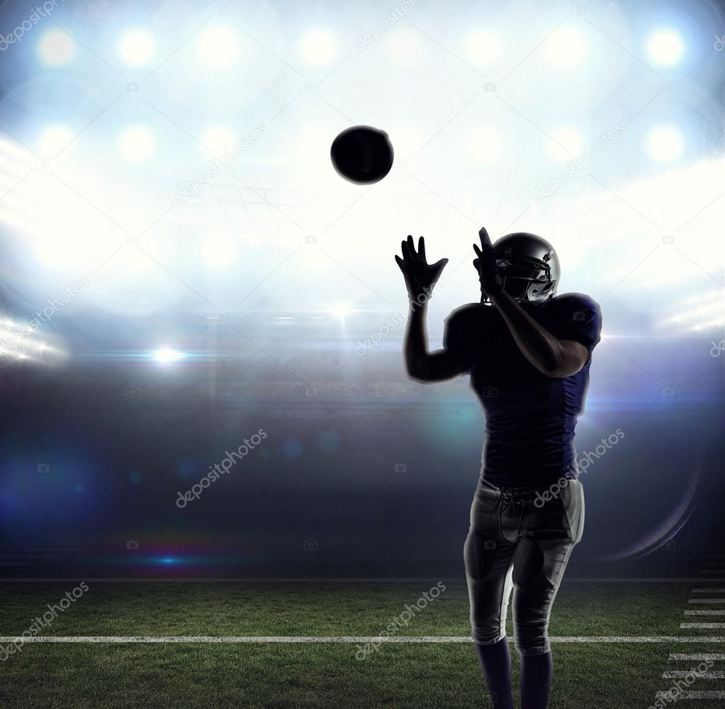American football player catching ball — Stock Photo © Wavebreakmedia ... American football player catching ball — Stock Photo © Wavebreakmedia ...