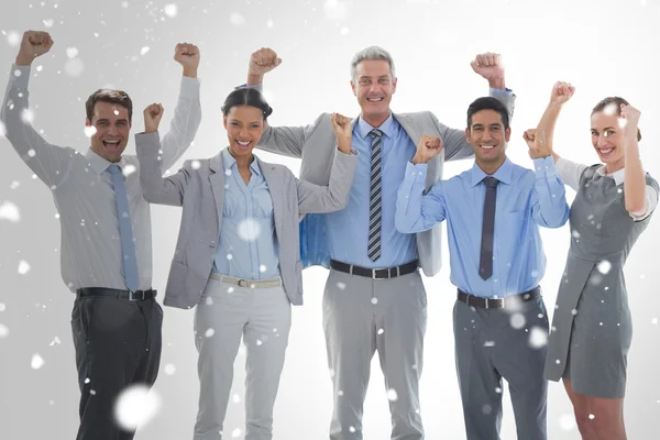 Business people cheering in office Stock Photo by ©Wavebreakmedia 76337417