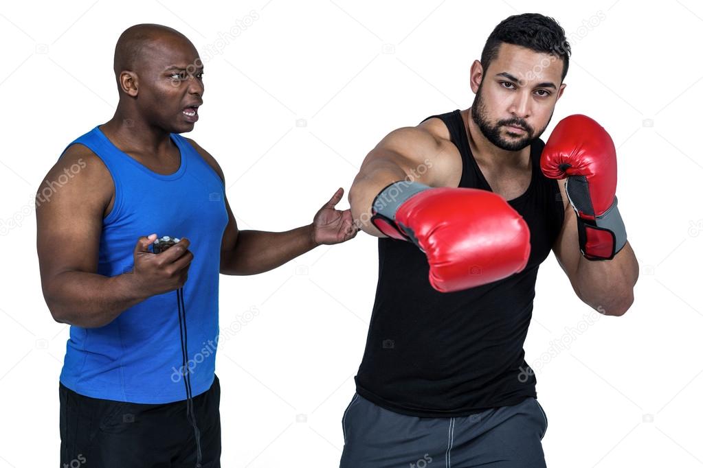 Boxing coach with his fighter Stock Photo by ©Wavebreakmedia 90178752