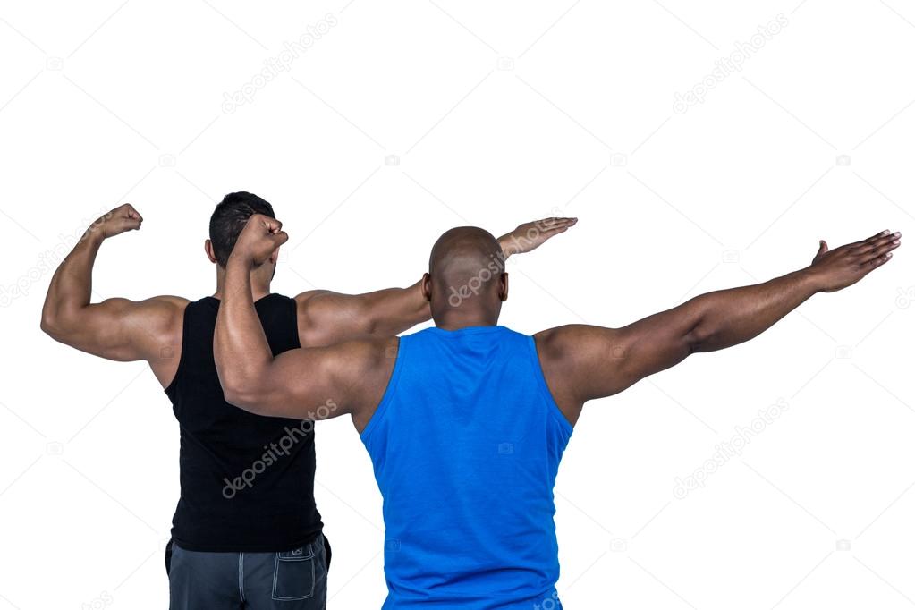 Friends posing with arms out Stock Photo by ©Wavebreakmedia 90458362