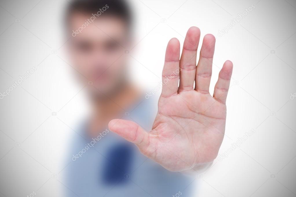 Serious man making stop sign — Stock Photo © Wavebreakmedia #91197964