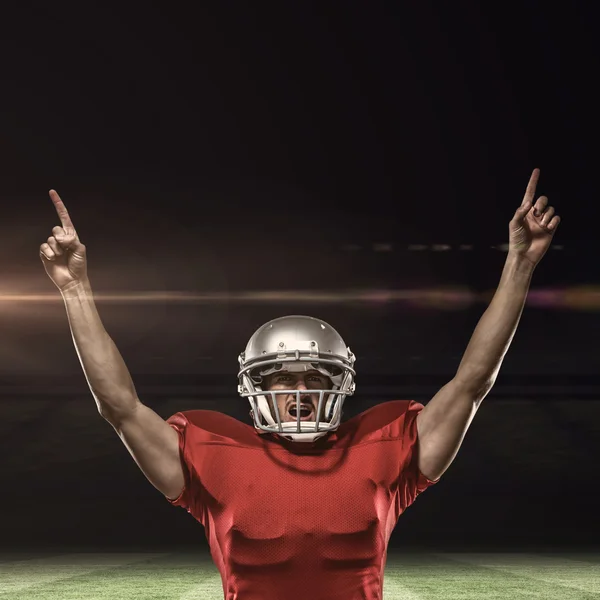 American football player with arms raised - Stock Image - Everypixel