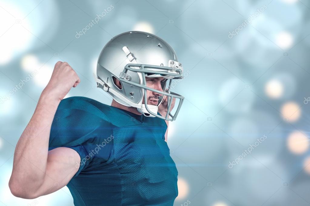 American football player flexing muscles — Stock Photo © Wavebreakmedia ...