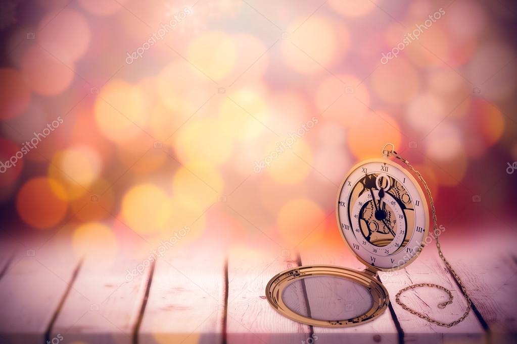 Vintage pocket clock with chain Stock Photo by ©Wavebreakmedia 91995466