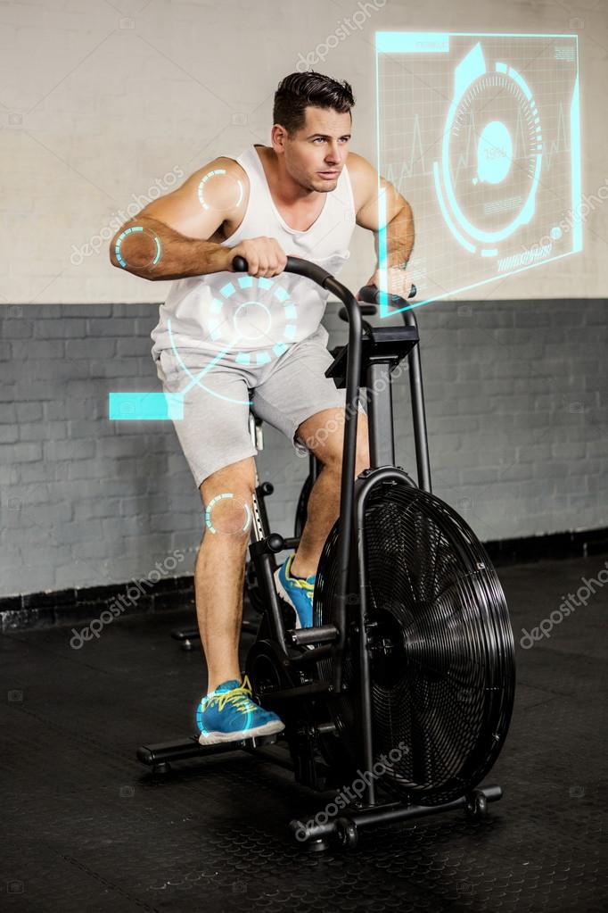 Man riding exercise bike — Stock Photo © Wavebreakmedia #93765066