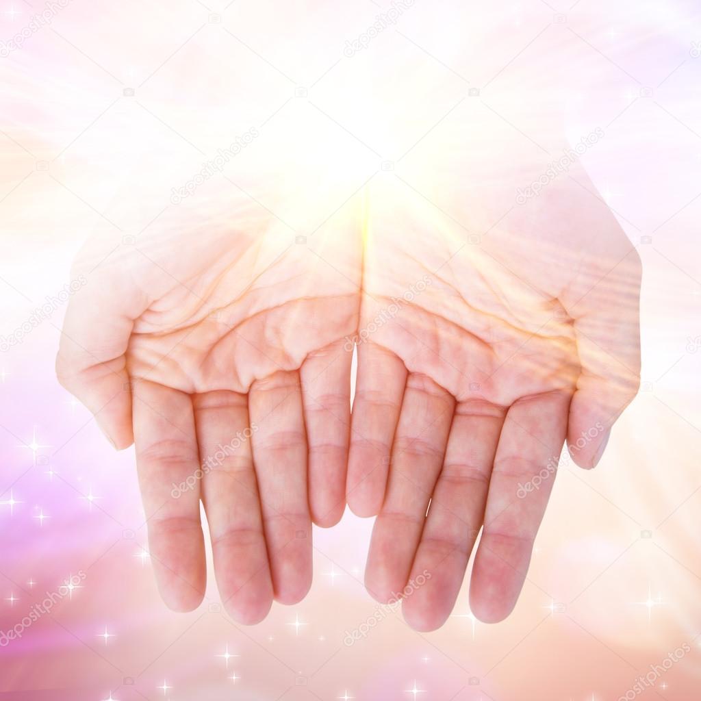 Hands showing against glowing background Stock Photo by ©Wavebreakmedia ...
