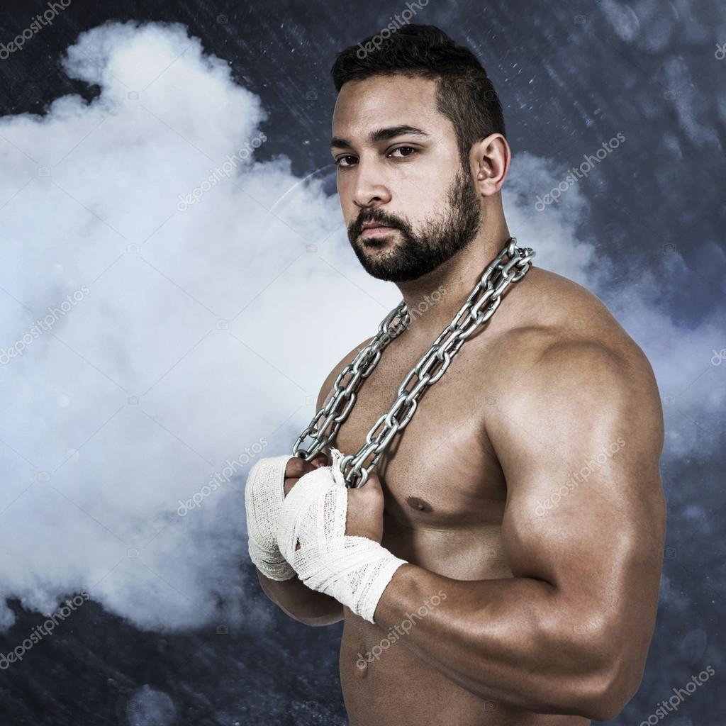 Muscular man with a chain — Stock Photo © Wavebreakmedia #93766256
