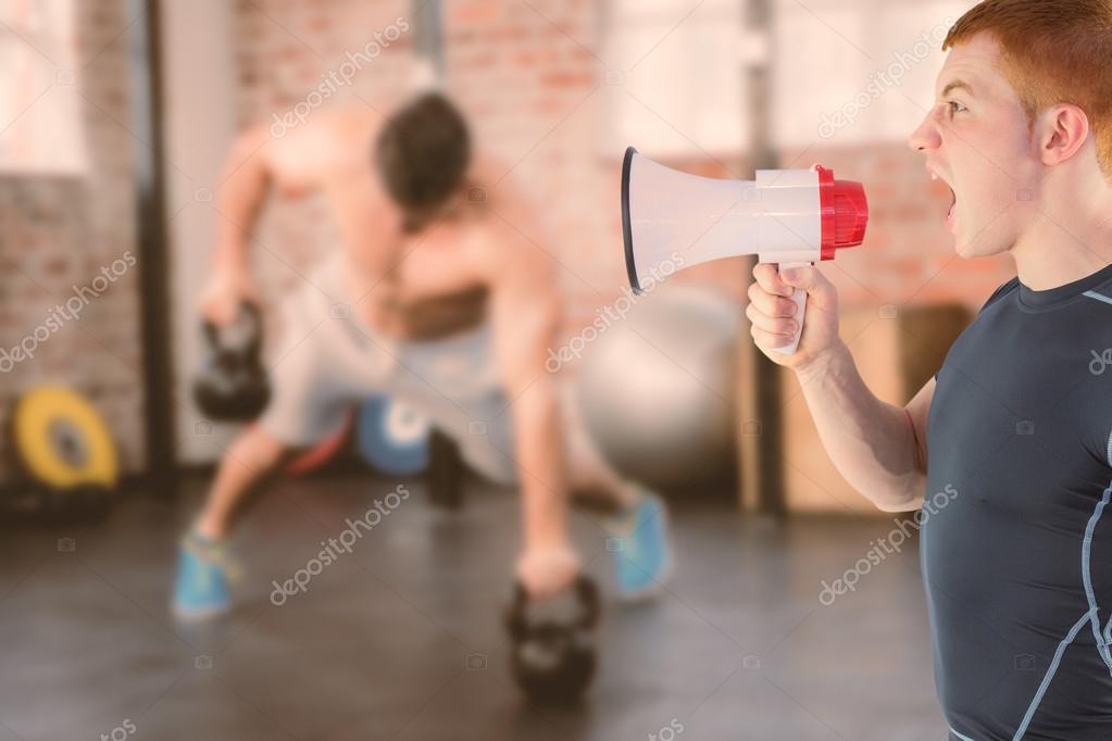 Rugby player yelling through the megaphone — Stock Photo ...