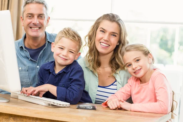 Happy family using the computer - Stock Image - Everypixel