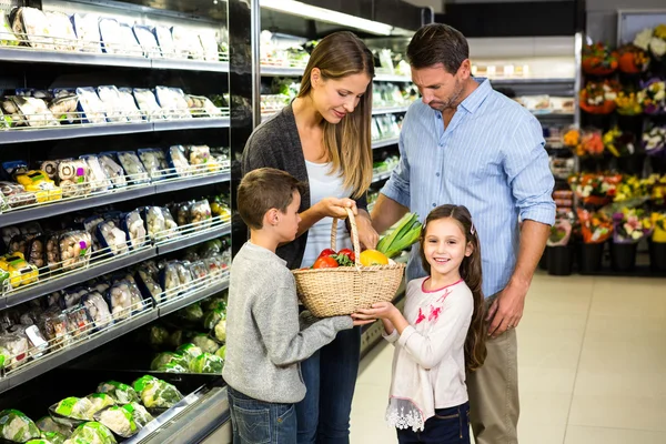 family doing grocery shopping together - Stock Image - Everypixel