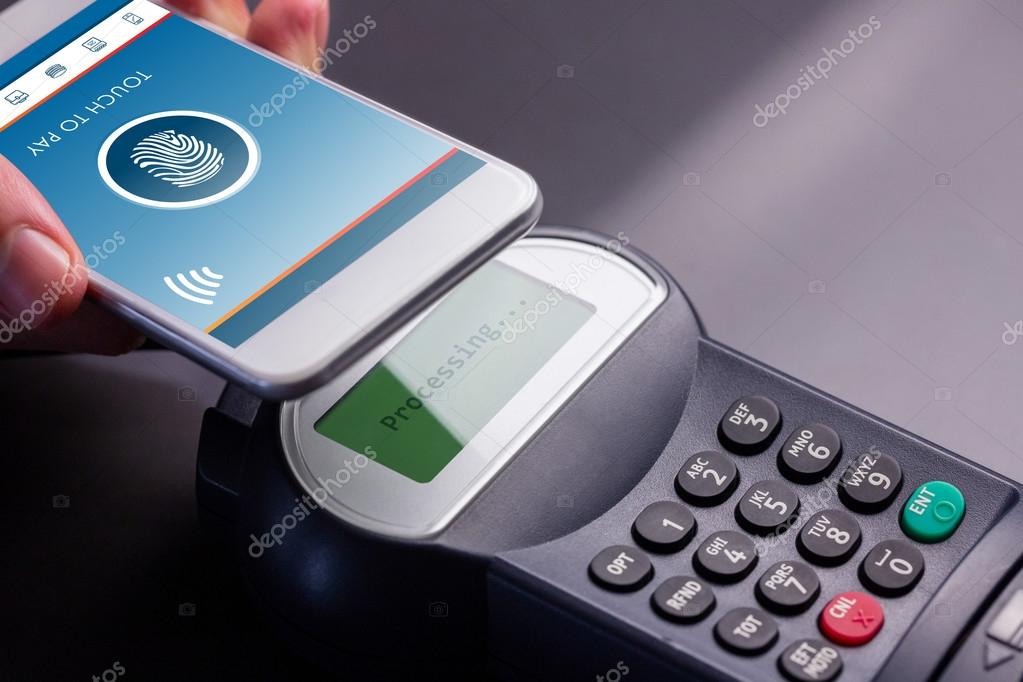 Man using smartphone to express pay — Stock Photo © Wavebreakmedia ...