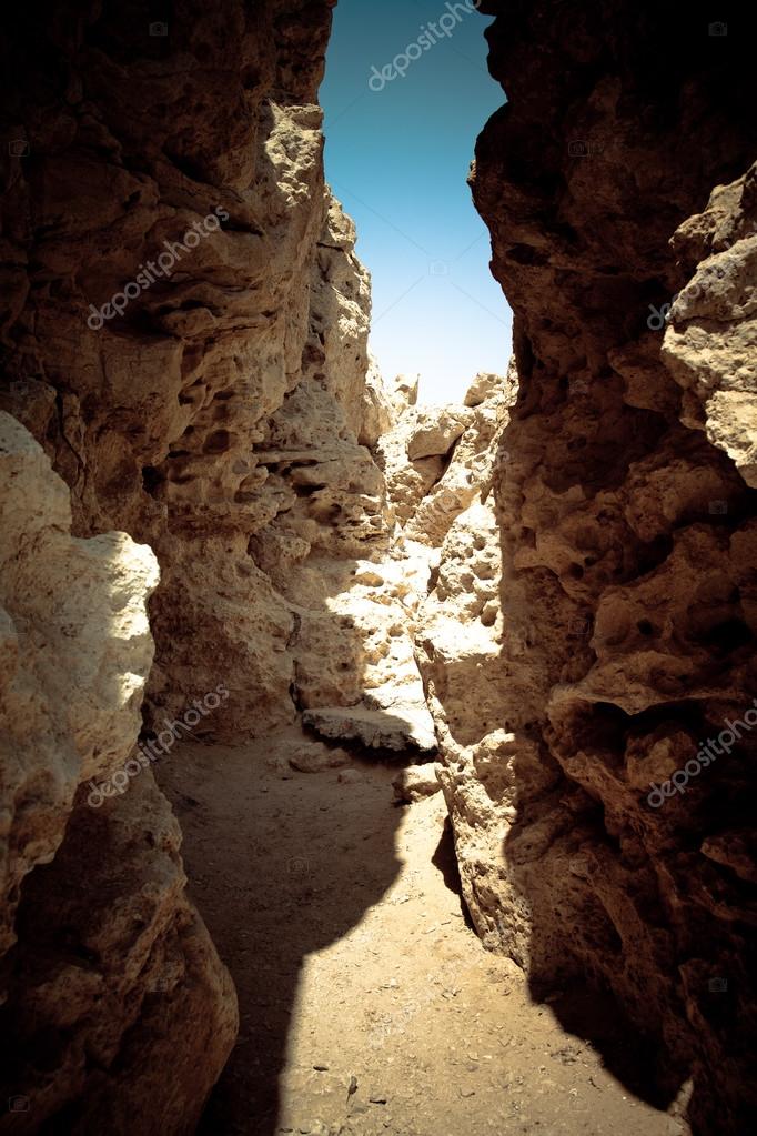 Crevice in the rock, forming a tunnel. tinted ⬇ Stock Photo, Image by ...