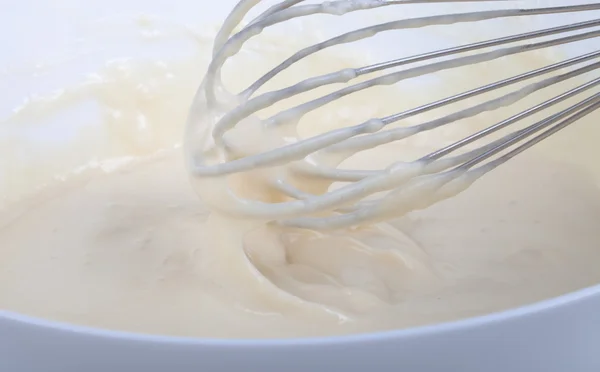 Mixed batter in a bowl and whisk - Stock Image - Everypixel