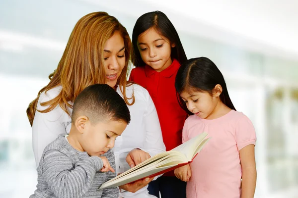 Hispanic Parent And Child Reading