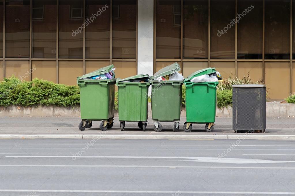 Over filled Wheelie bins, waste containers full of trash on Australia ...