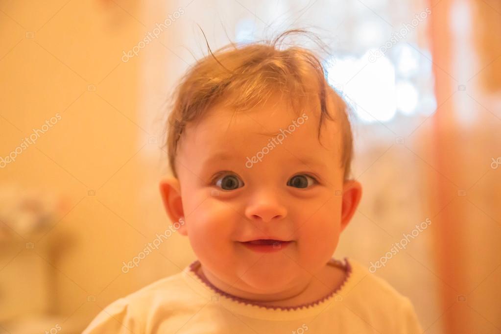 Funny baby face close-up Stock Photo by ©Vitalinka 123493802