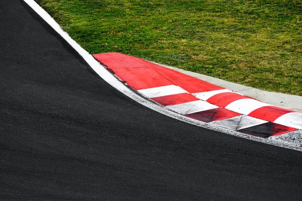 Race track curve road for car racing Stock Photo by ©kadrby 121679128