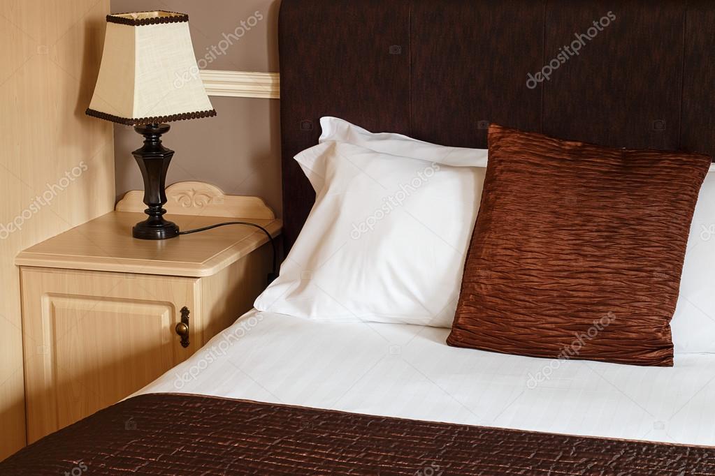Generic bed and breakfast room Stock Photo by ©Stocksolutions 92185272