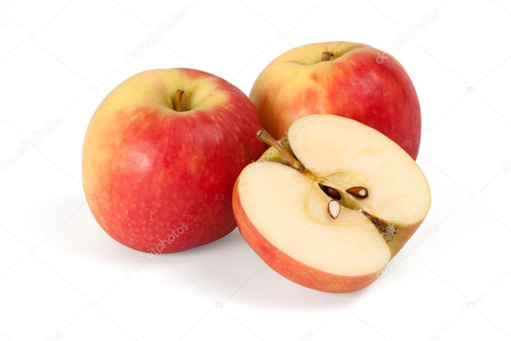 Two apples and half apple sliced Stock Photo by ©sriharun 54826695