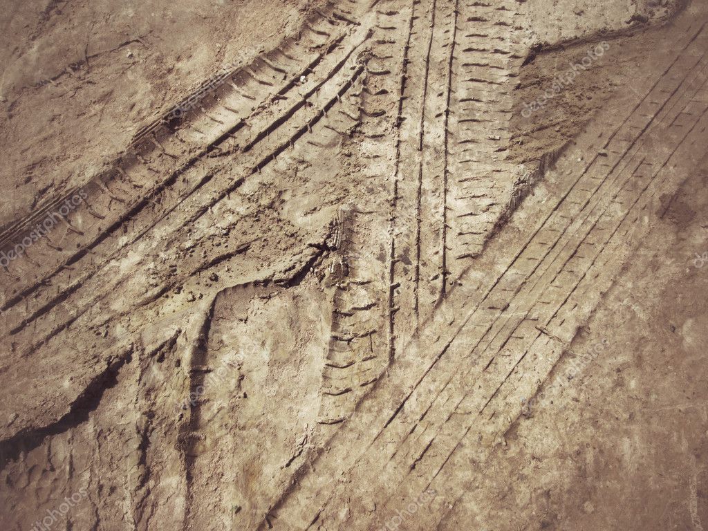 Wheel tracks on the soil. Stock Photo by ©luknaja 53592317